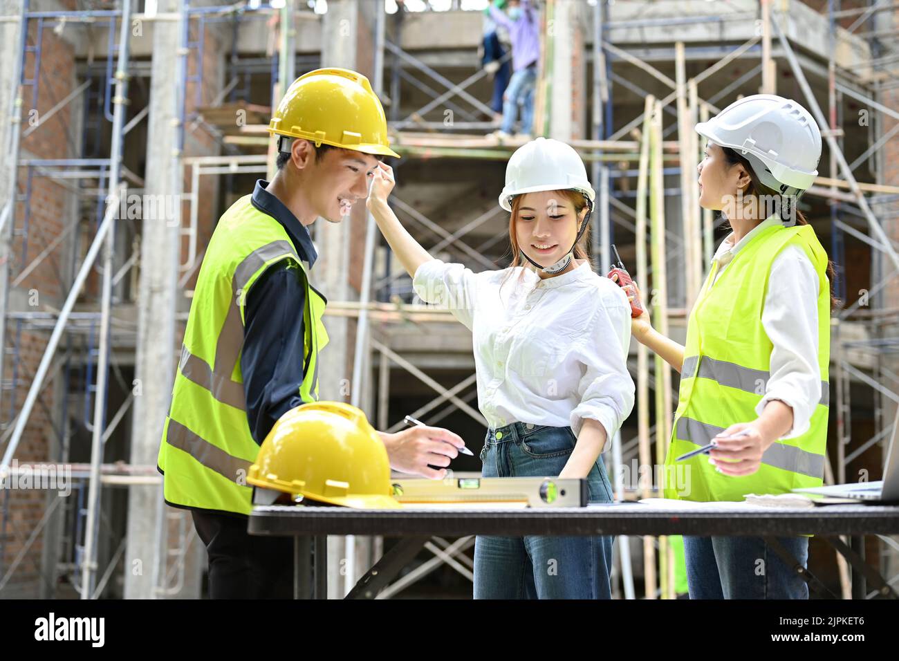 Teamwork three young architects working hi-res stock photography and ...