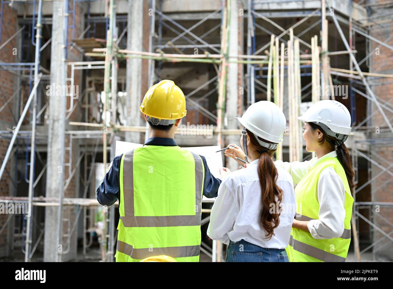 Two professional Asian female engineers are working and inspecting the ...