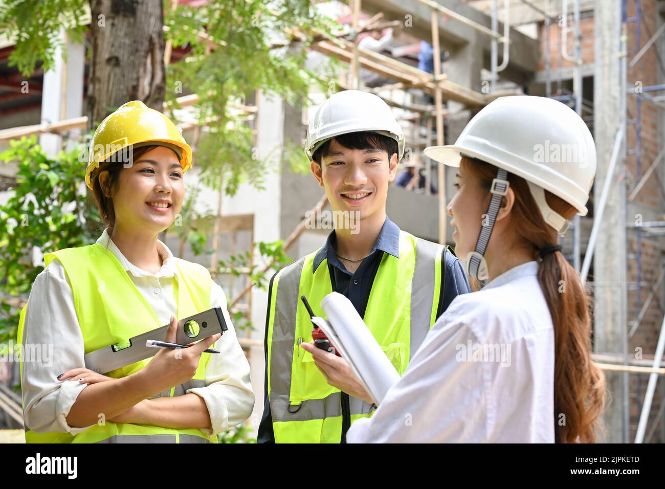 A professional and attractive Asian female architect manager having a ...