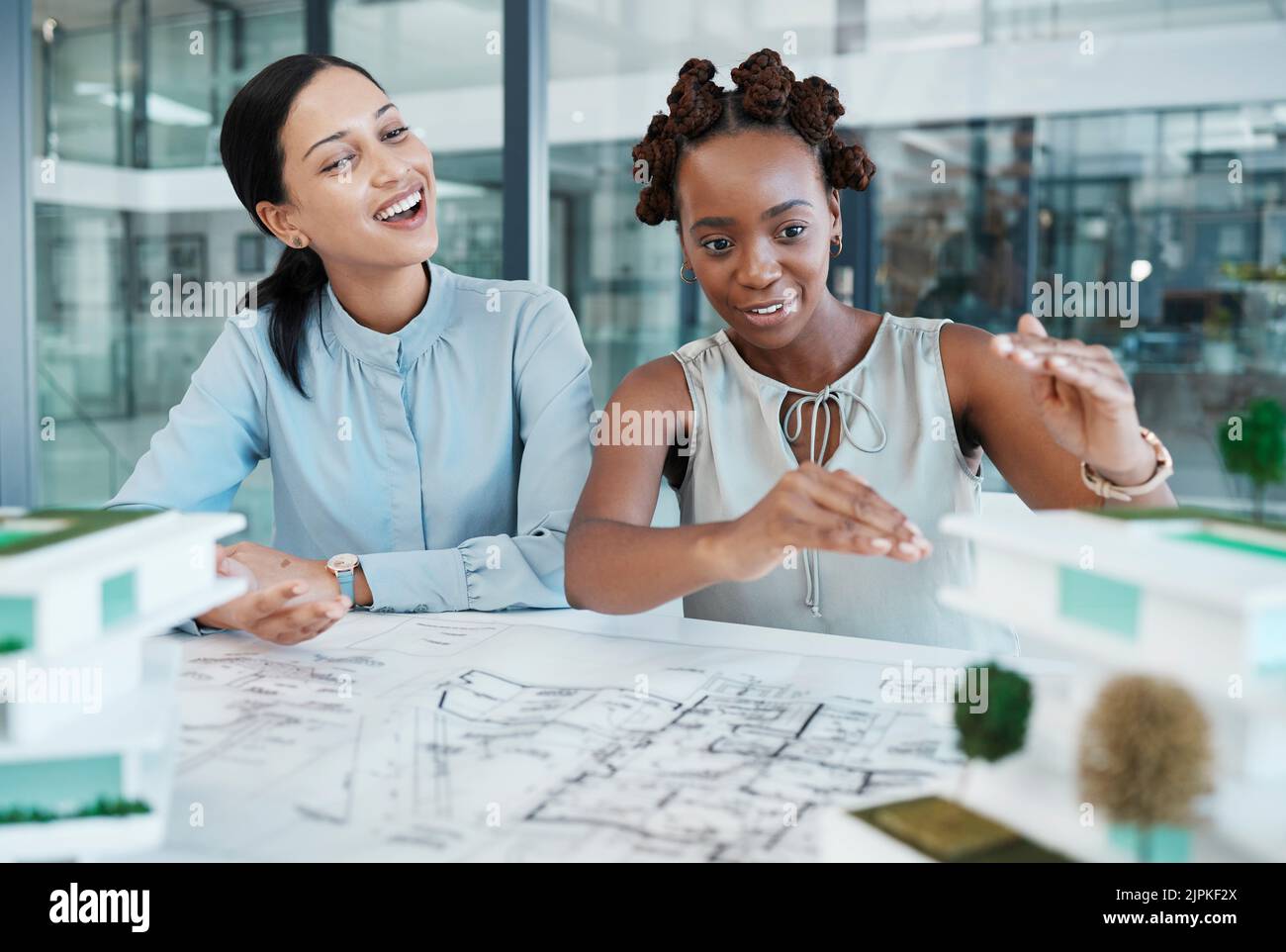 Industrial engineer or architect planning building model design project ...