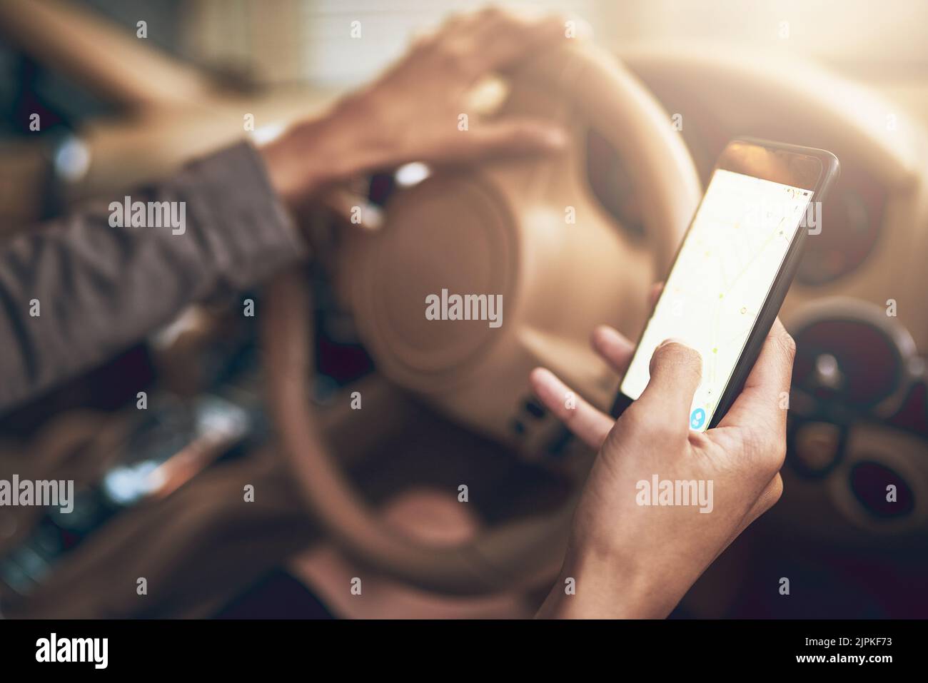 Connected in commute. an unidentifiable businesswoman using a cellphone ...