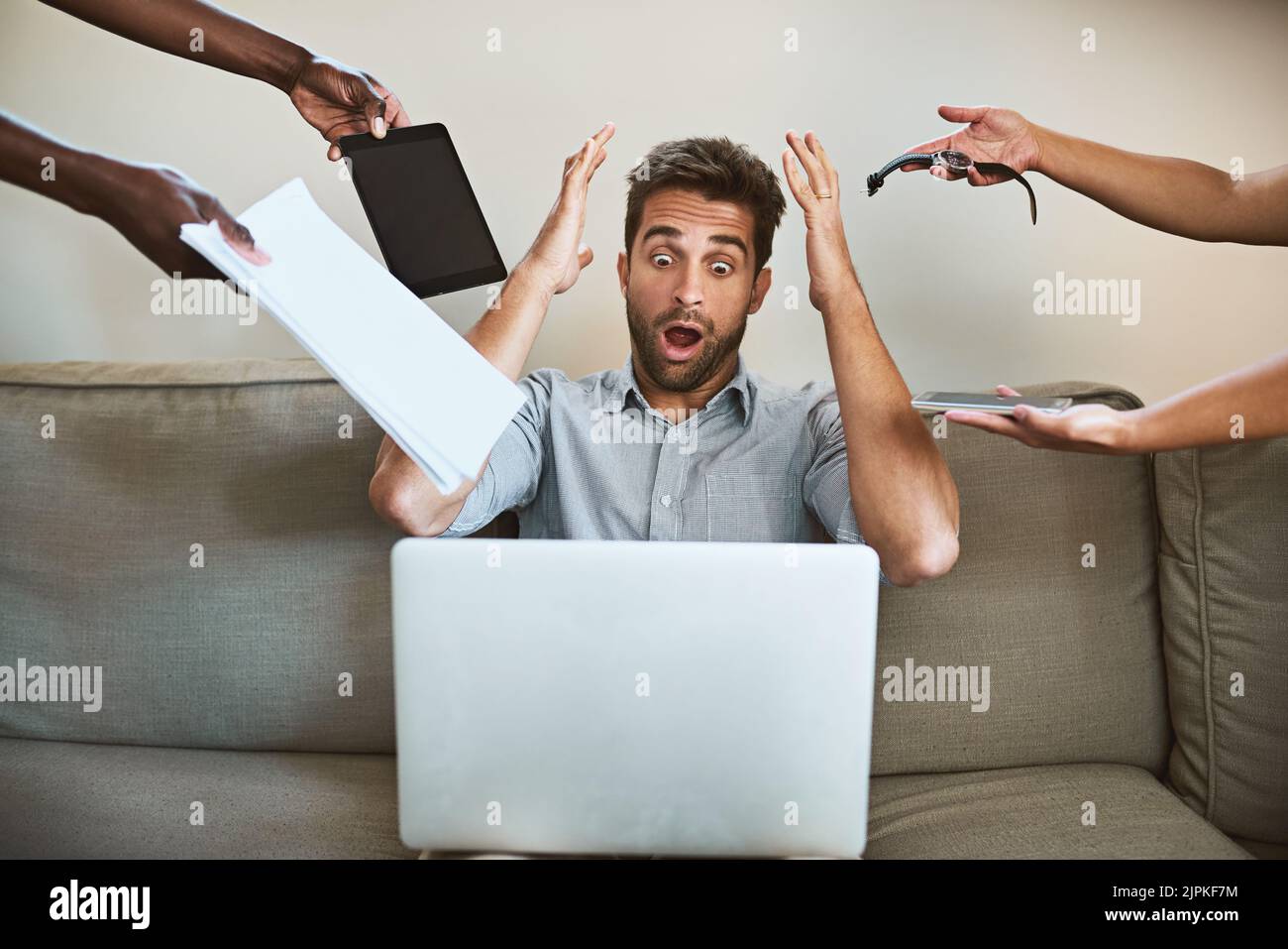 My brain is going to explode. a surprised young businessman being ...