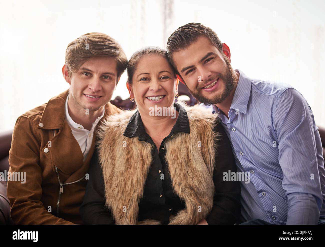 My sons outgrew my lap but never my heart. a mother and sons sitting on ...