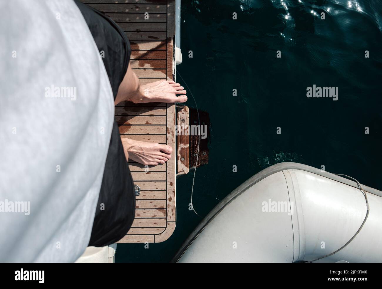 Man on ocean view legs hi-res stock photography and images - Alamy