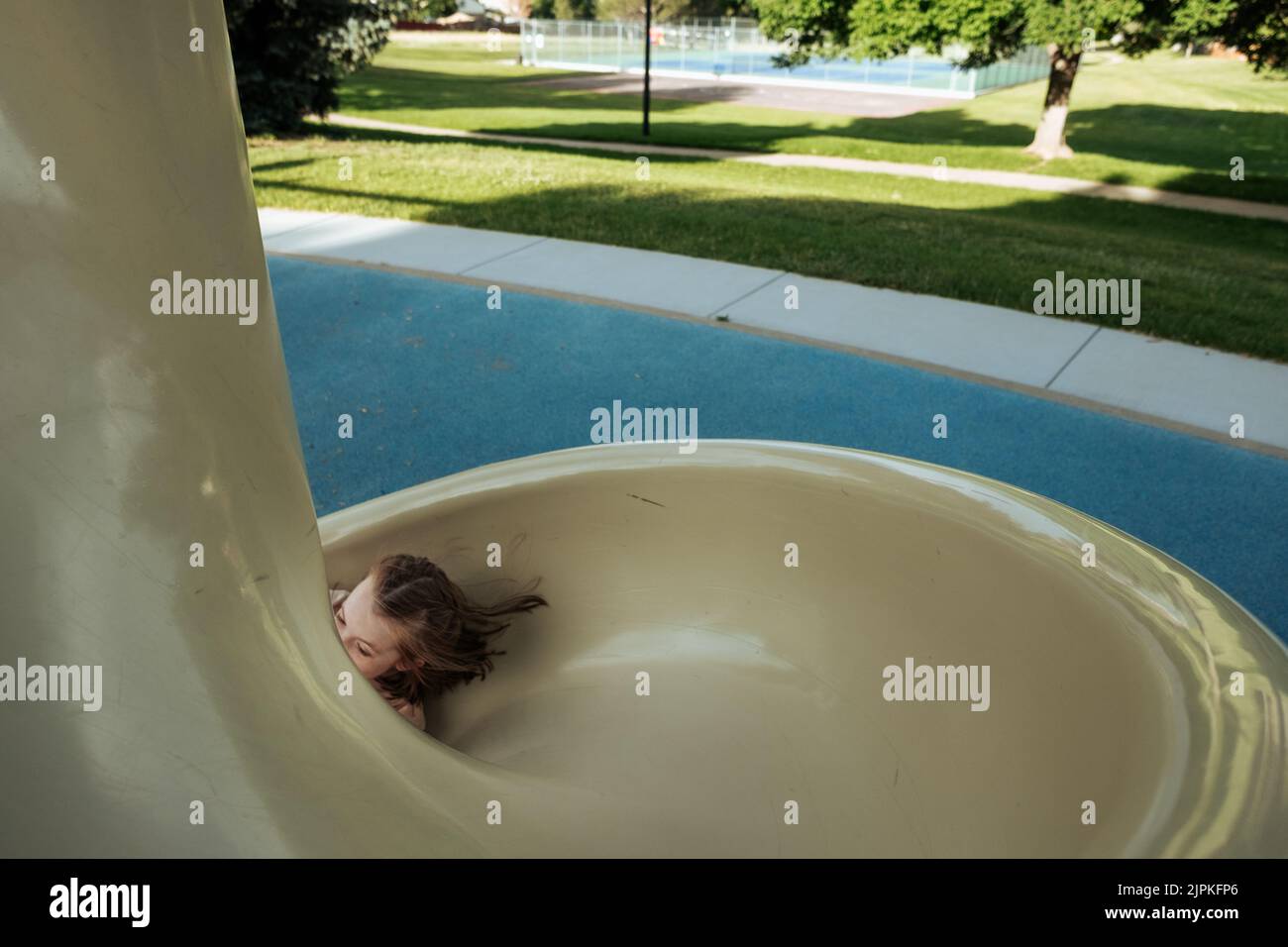 Going down the slide hi-res stock photography and images - Alamy