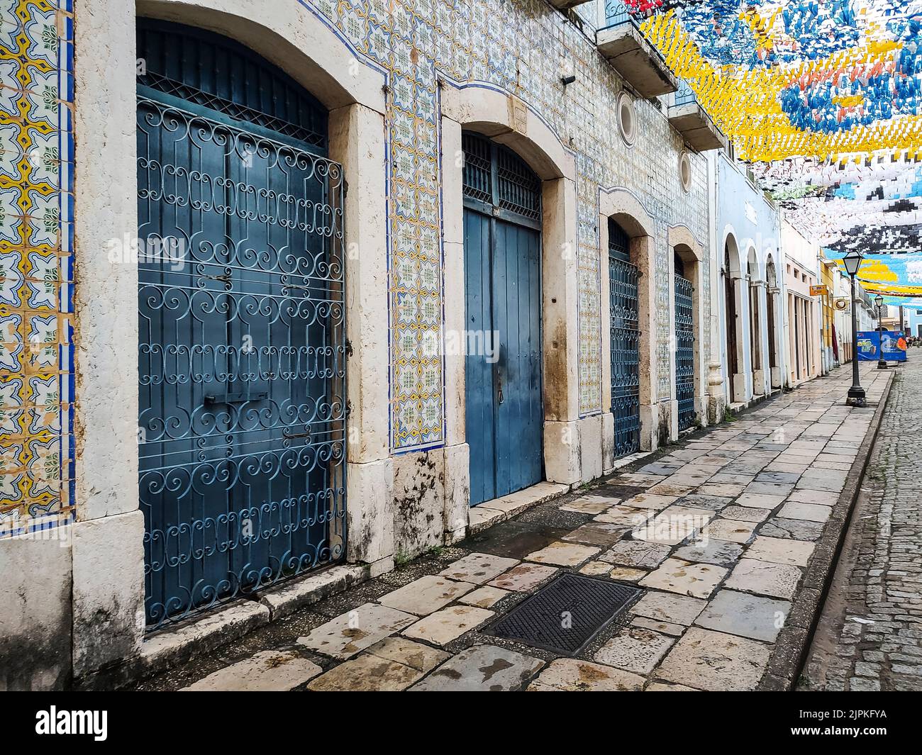 View to traditional tiles on historic downtown building facade Stock ...