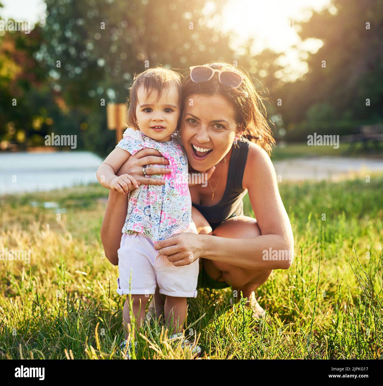 My tiny bundle of joy. a young mother and her little girl outdoors ...