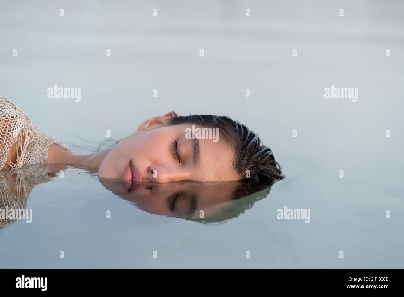 Lady laying in water hi-res stock photography and images - Alamy