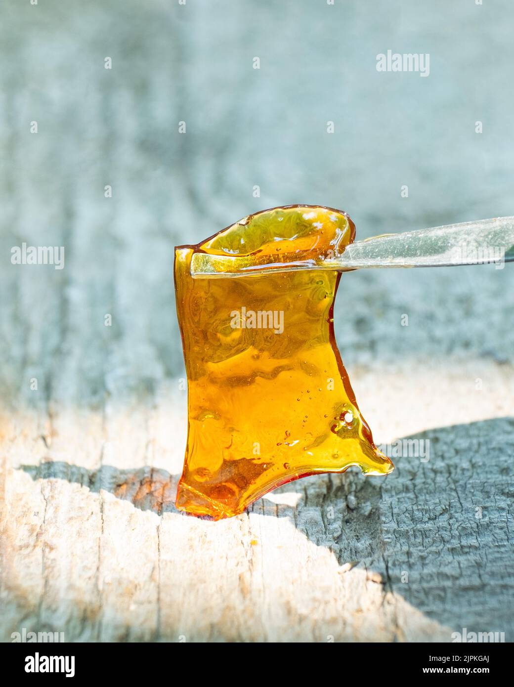 marijuana wax smear, cannabis dab with stick closeup Stock Photo - Alamy