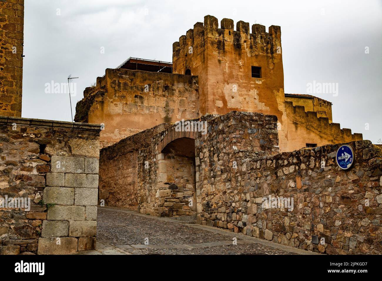 Castle tower on beige stone walls Stock Photo - Alamy