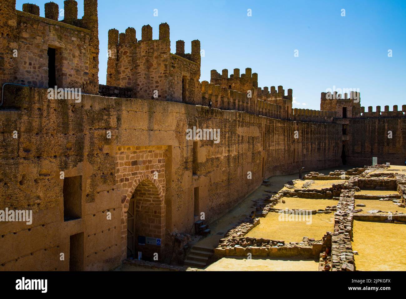 Fortress castle with towers in the wall and a large interior tower ...