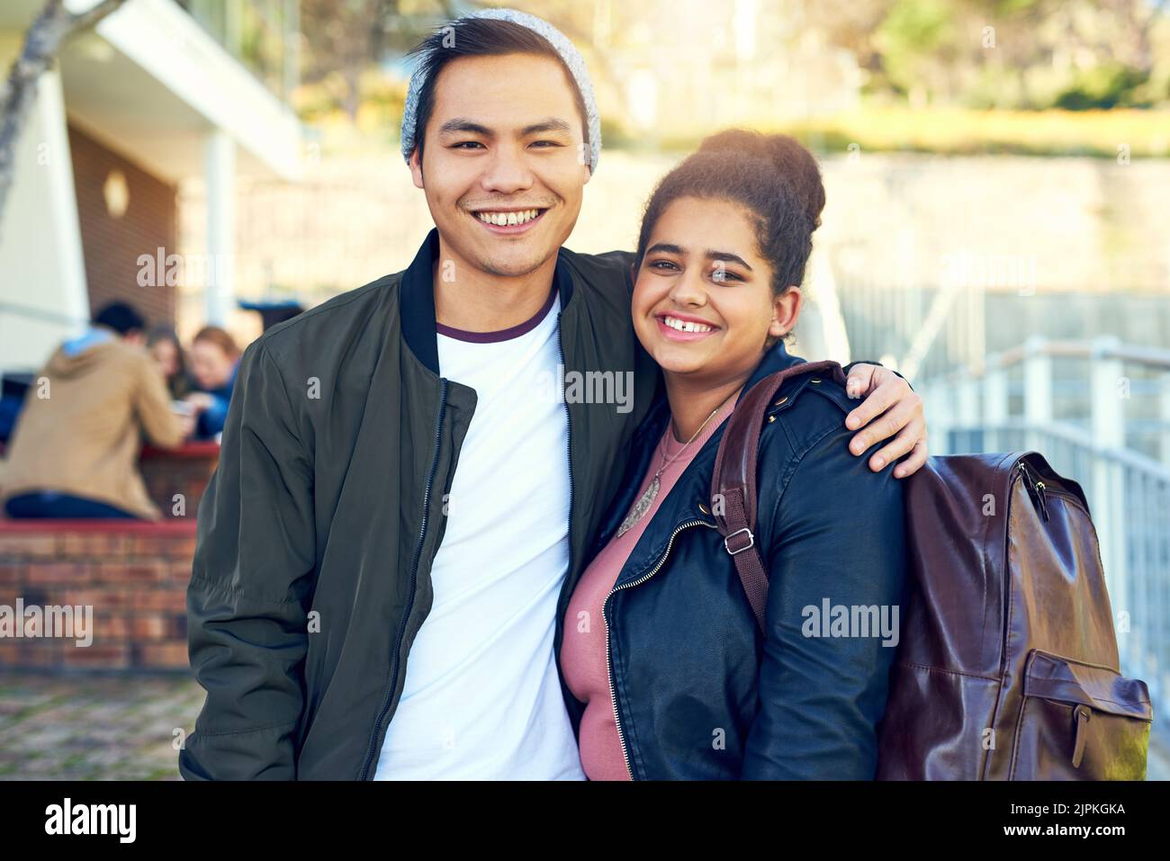 Happy to back on campus. college students between classes on campus ...