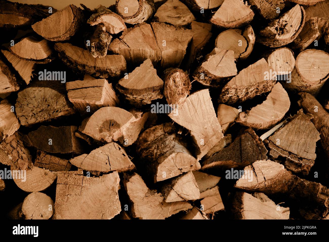 Firewood stack background. Natural wood chopped for heating Stock Photo ...