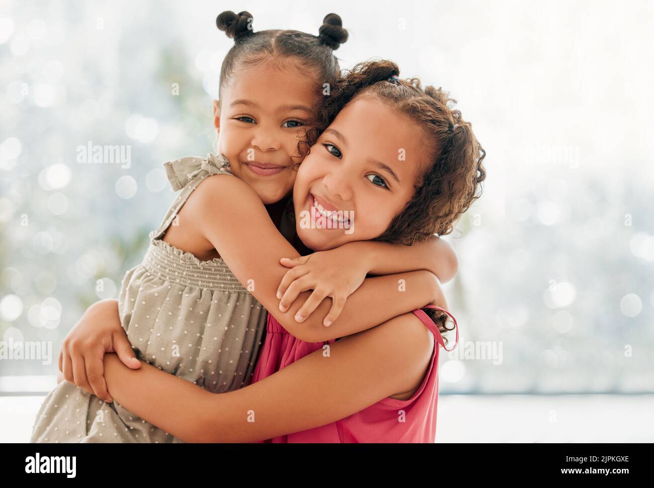 Cute, adorable and sweet girls hugging and bond with a happy and ...