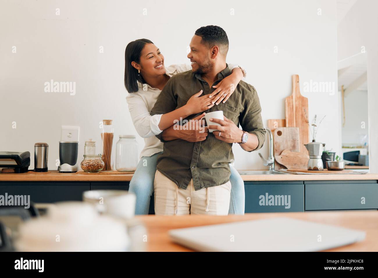 Happy, hugging and romantic couple bonding and feeling united ...