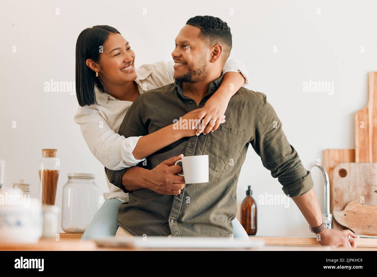 Happy, coffee and loving couple bonding and having fun while spending ...