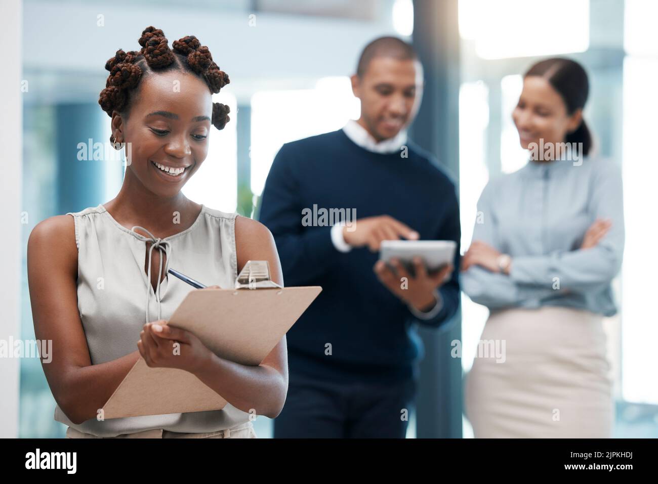Planning, organizing HR manager with a clipboard checklist for workflow ...