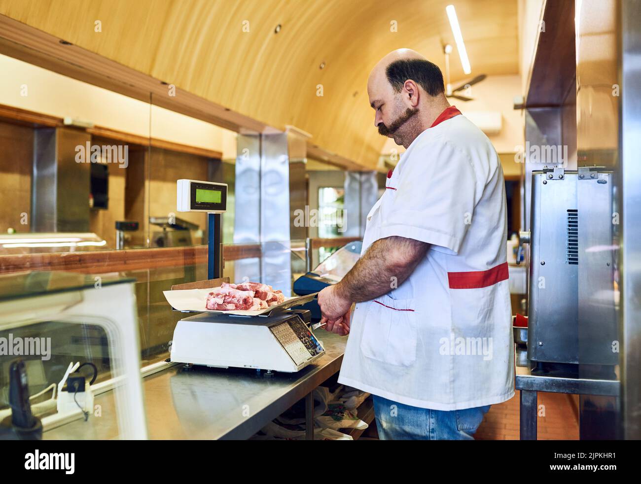 In store butcher hi-res stock photography and images - Alamy