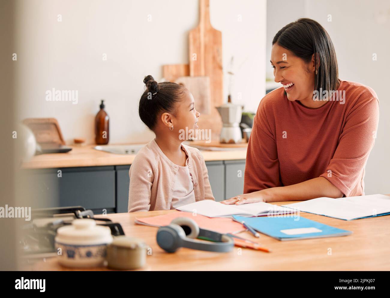 Home school, laughing, child and mother bonding after homeschool homework, school work and ...