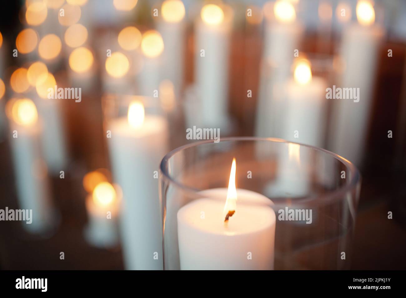 White candles background = burning our fo focus fire Stock Photo - Alamy