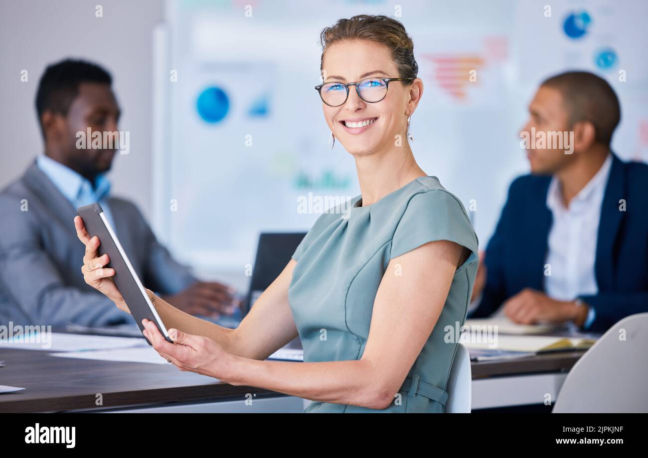 Boardroom executive, leader and manager browsing on tablet during ...