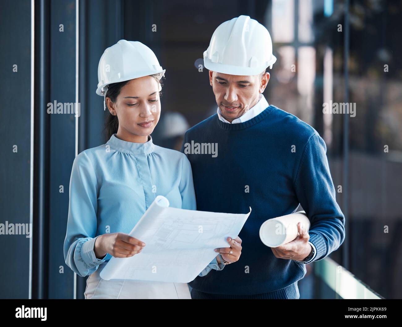 Architecture, civil and architect engineers busy with a floor plan or ...