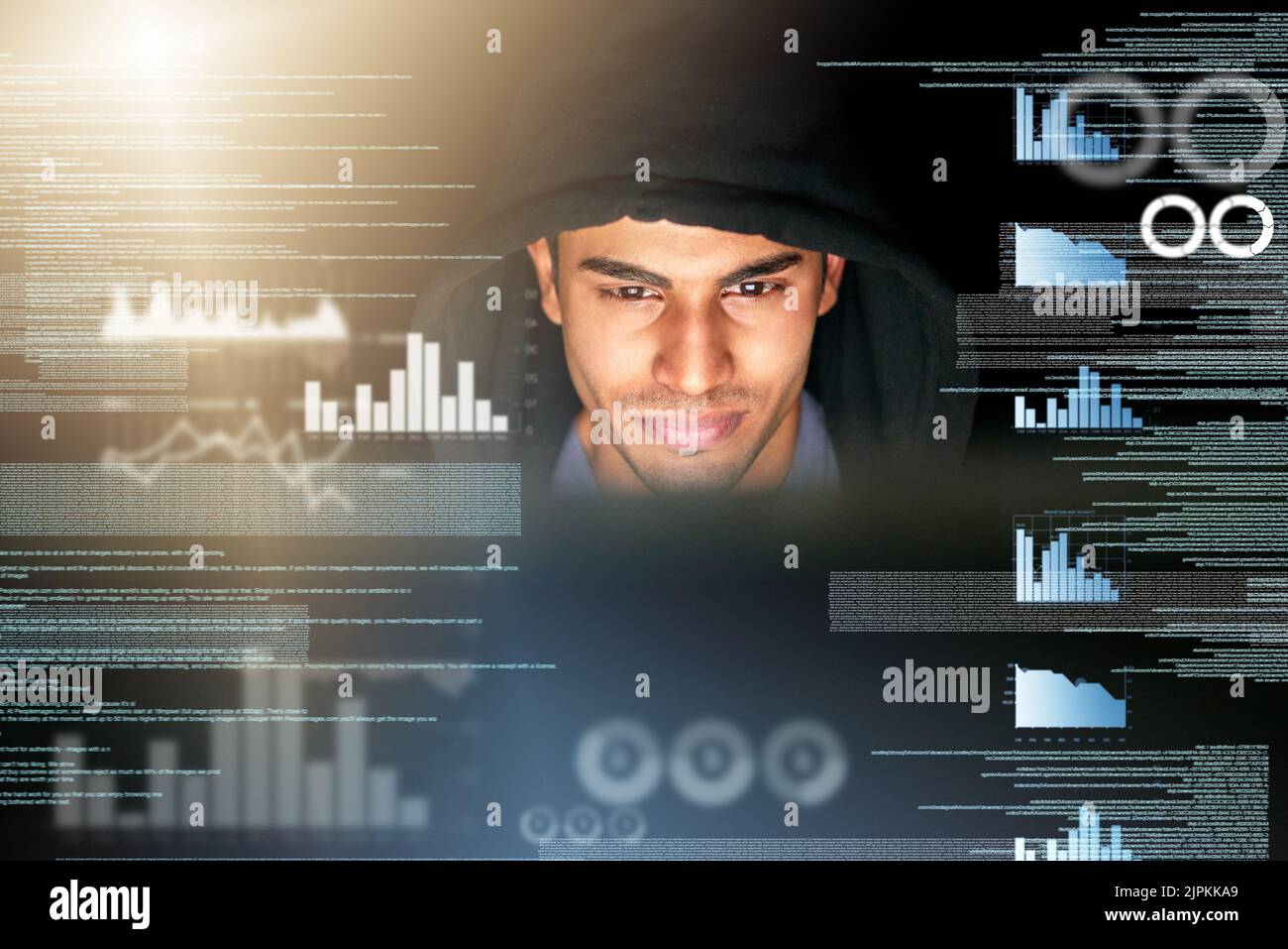Focused on the code. a handsome young male computer programmer working ...