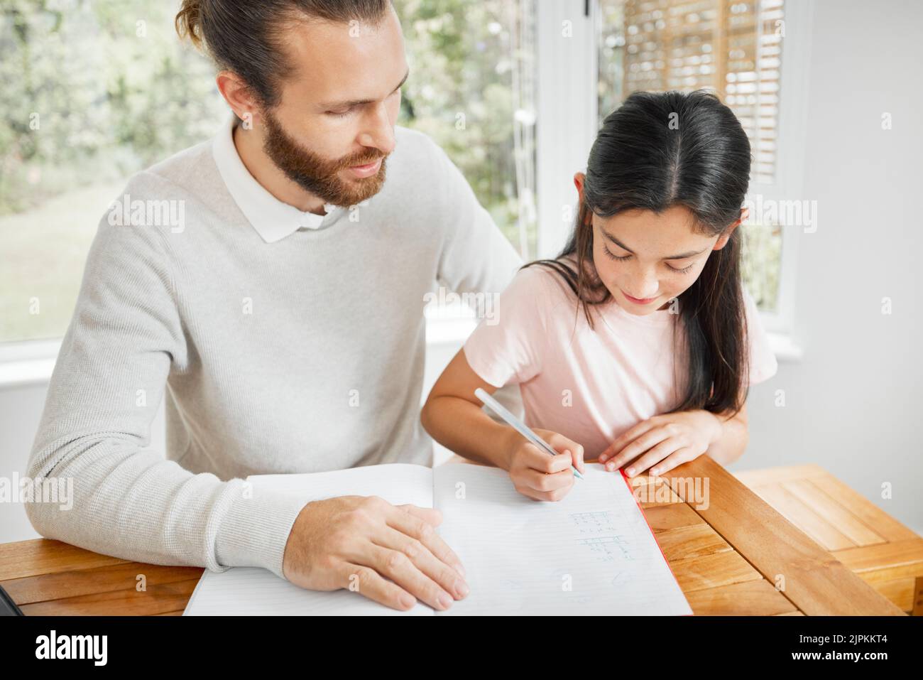 Father helping homeschool kid with homework, studying and learning math ...