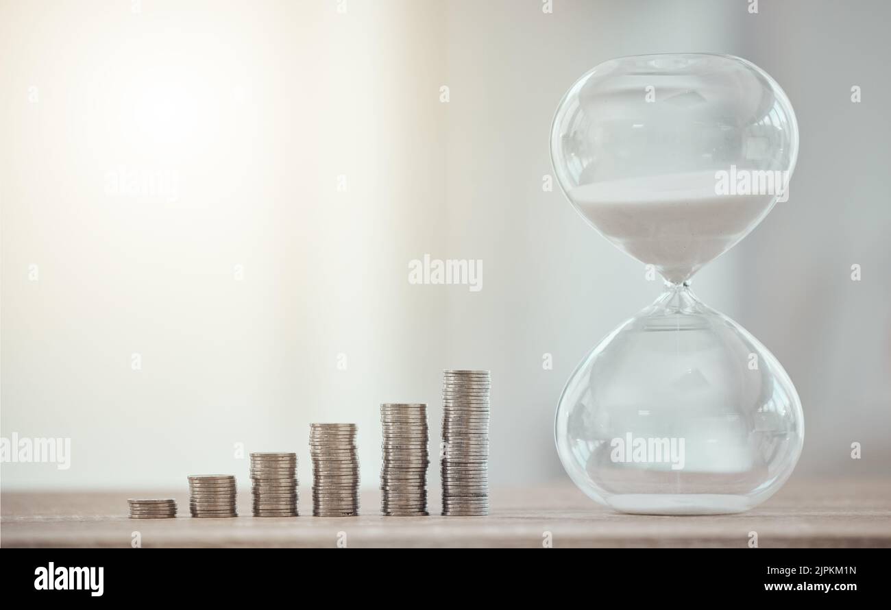Cash coins for a future investment with hourglass, savings and growth ...