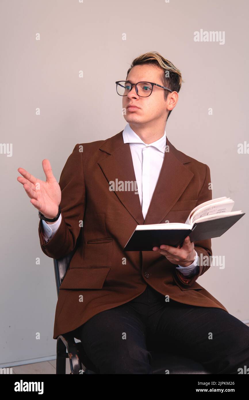 Elegant man with eyeglass with an expression of doubt. Man in a suit ...