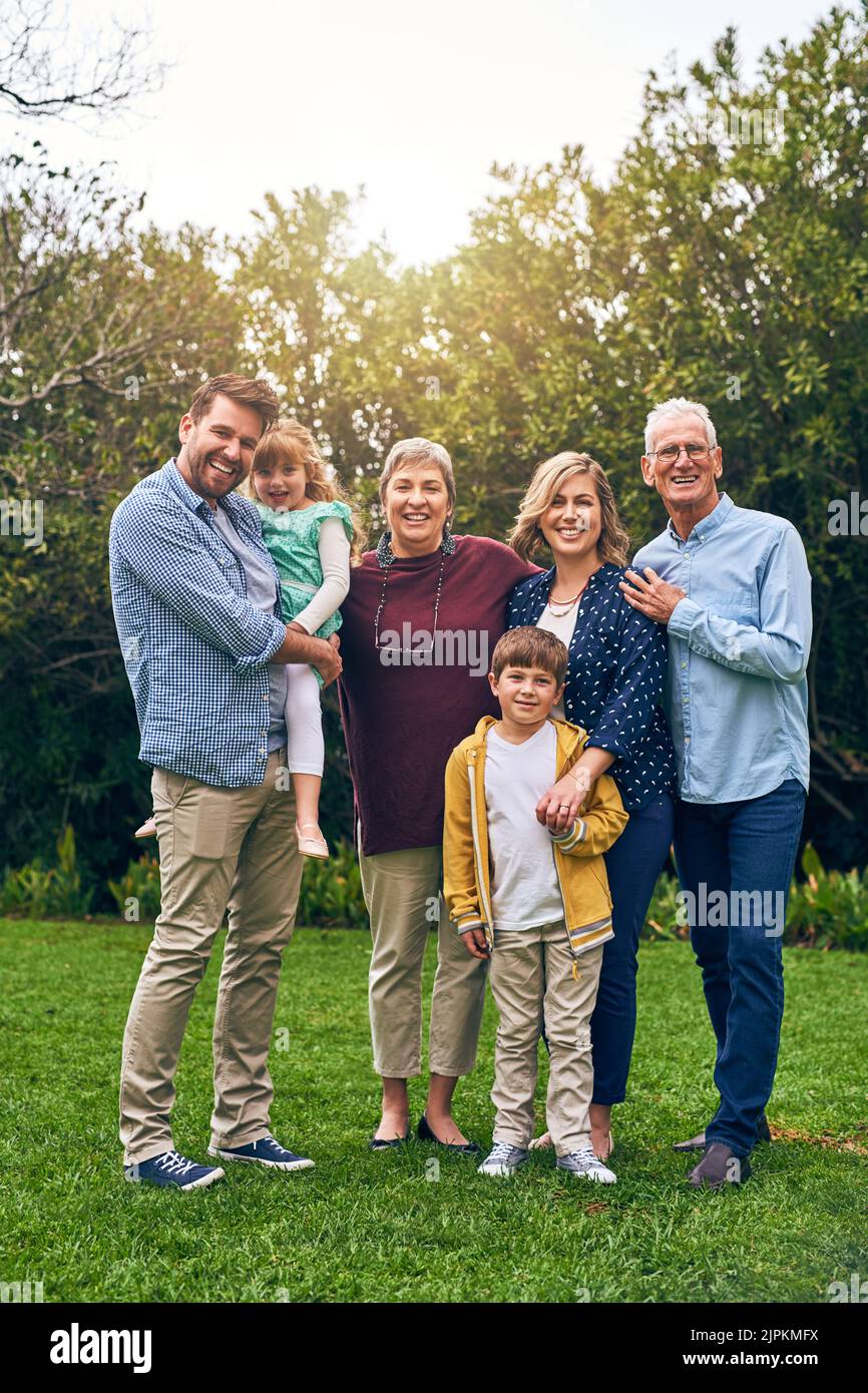 Family, a gift that lasts forever. a multigenerational family outside ...