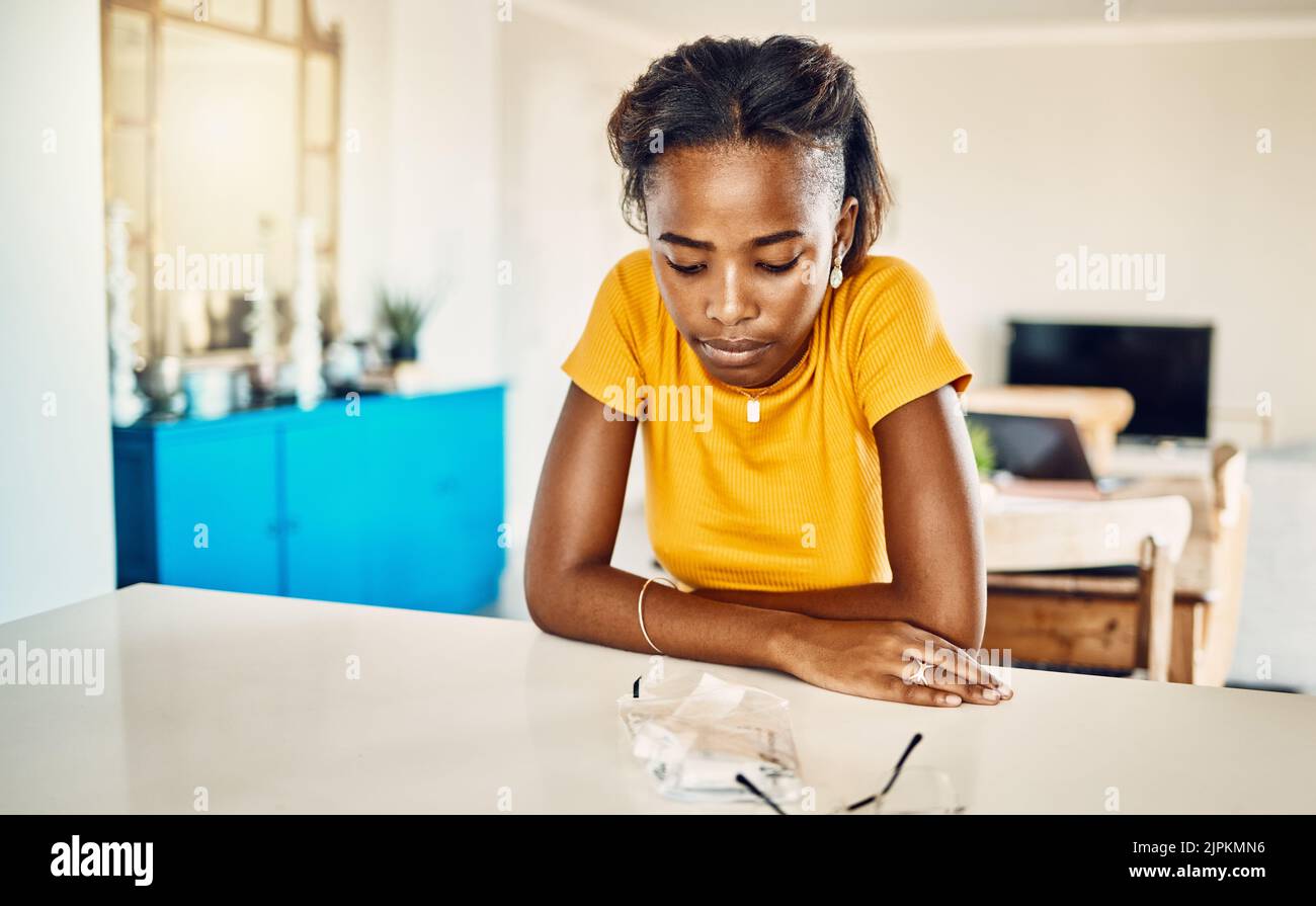 Covid, sick and waiting for rapid test result while looking worried ...