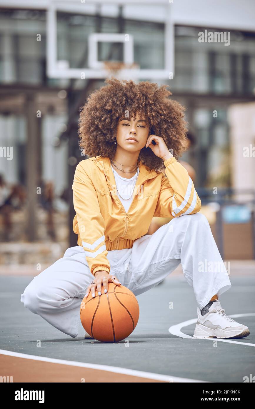 Basketball player on court, getting ready for game and looking serious ...