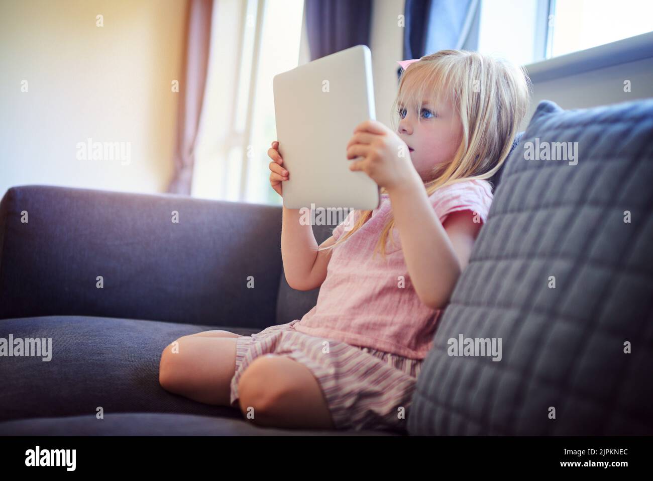 Getting up close and personal with her favourite cartoons. an adorable ...