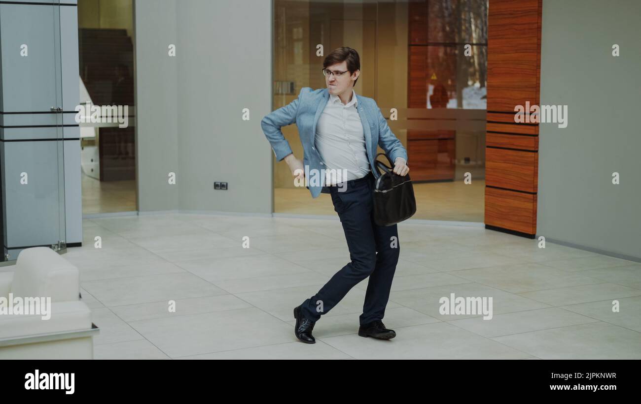 Man dancing alone in suit hi-res stock photography and images - Alamy