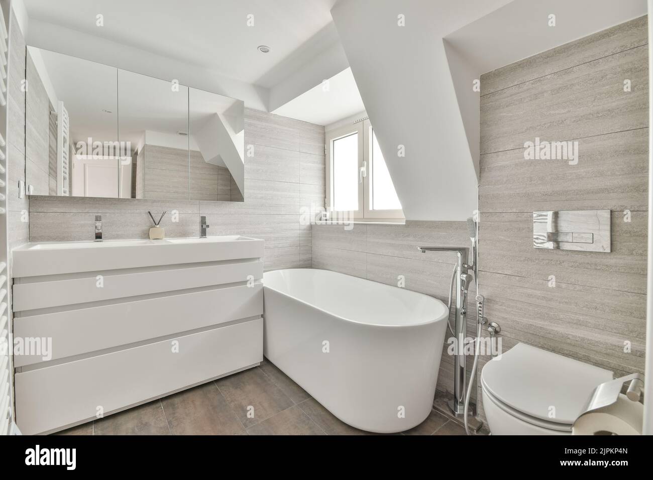 Modern home interior design of white bathroom with open bathtub and ...