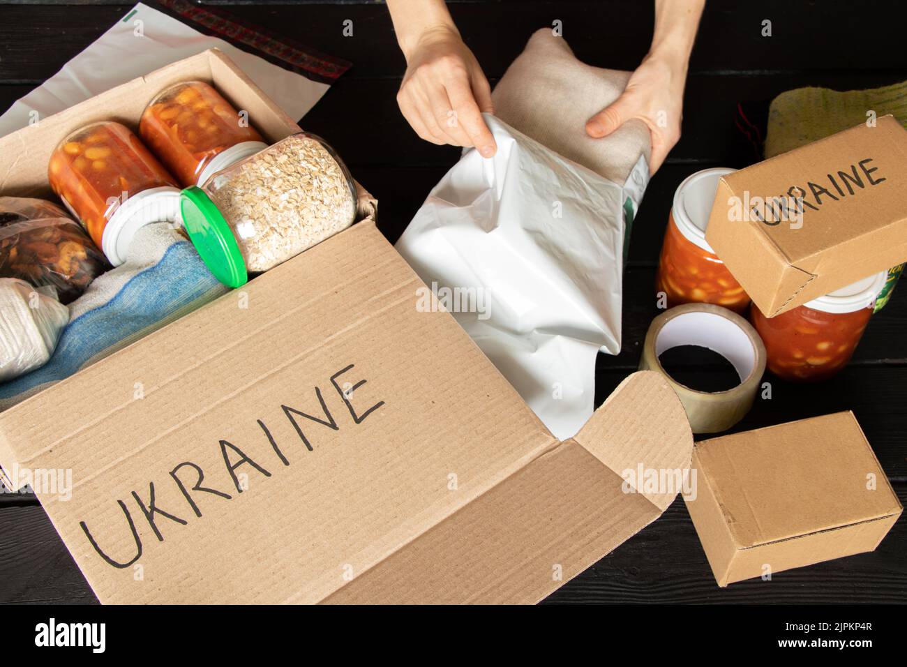 Collecting a humanitarian food set to help people who suffered during ...