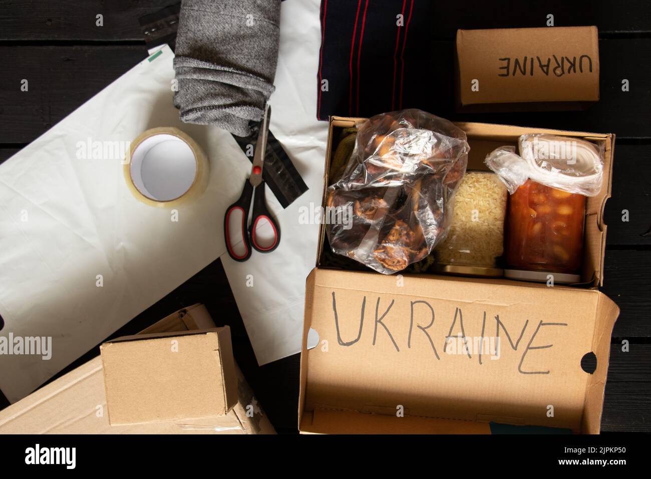 Collecting a humanitarian food set to help people who suffered during ...