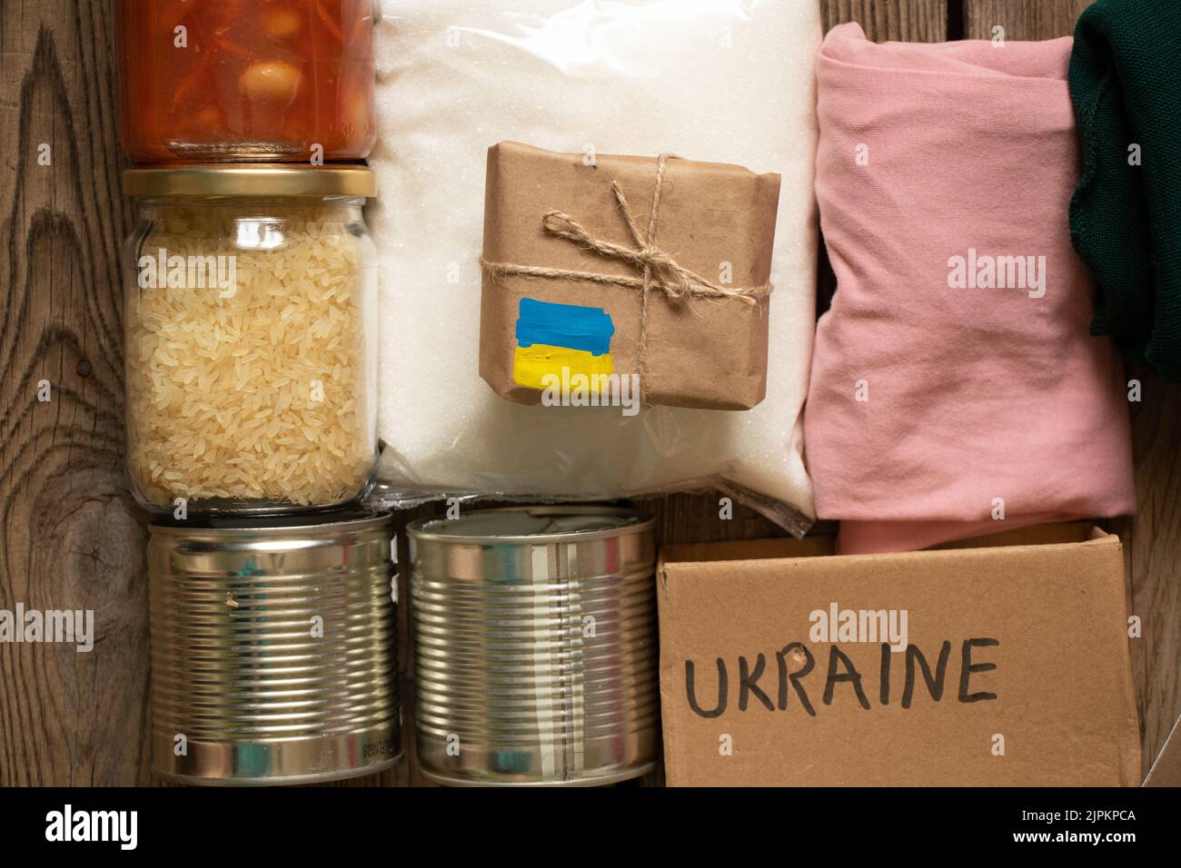 Collecting a humanitarian food kit to help people who suffered during ...