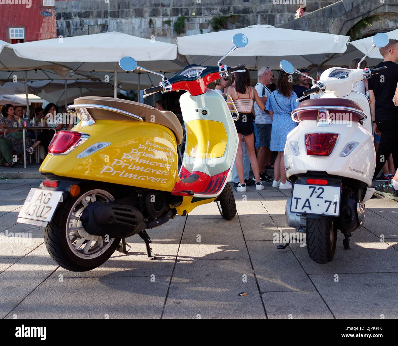 Colourful Vespas parked in the Ribeira aka riverside district in Porto ...