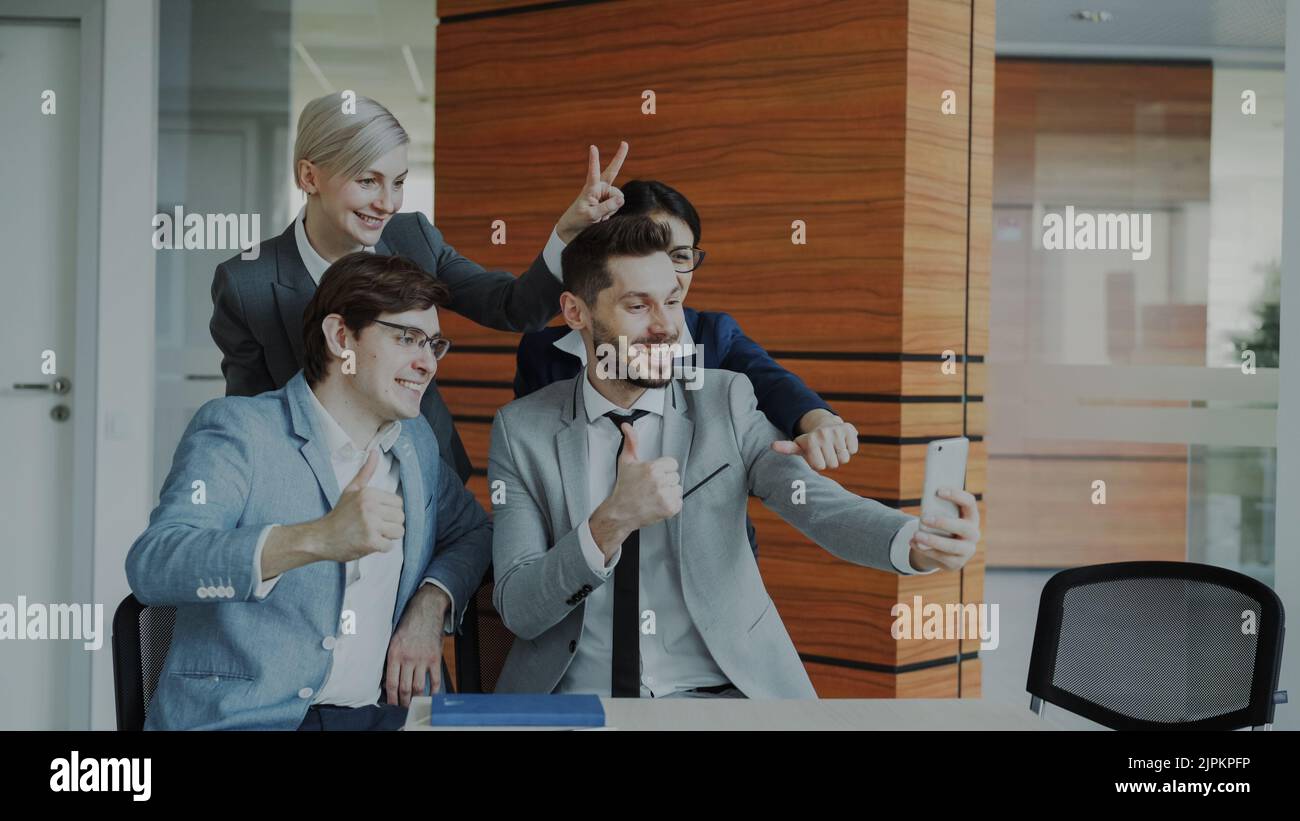 Startup team posing photo in hi-res stock photography and images - Alamy
