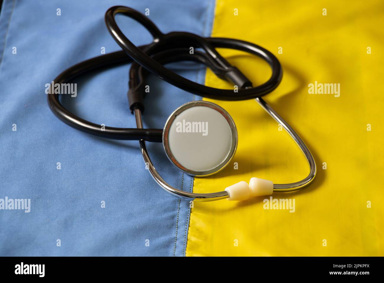 The stethoscope lies on the national flag of Ukraine yellow-blue ...