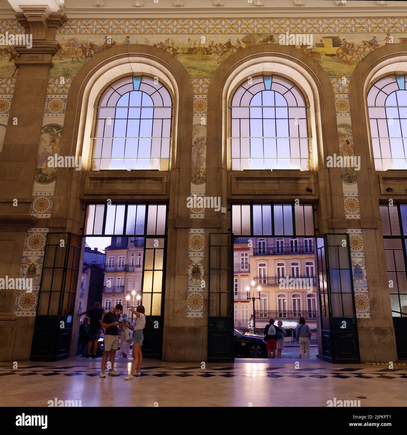 Entrance to Sao Bento Railway Station in Porto, Portugal at night as ...