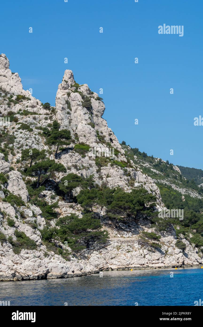 Limestone cliffs and blue sea near Cassis, boat excursion to Calanques ...