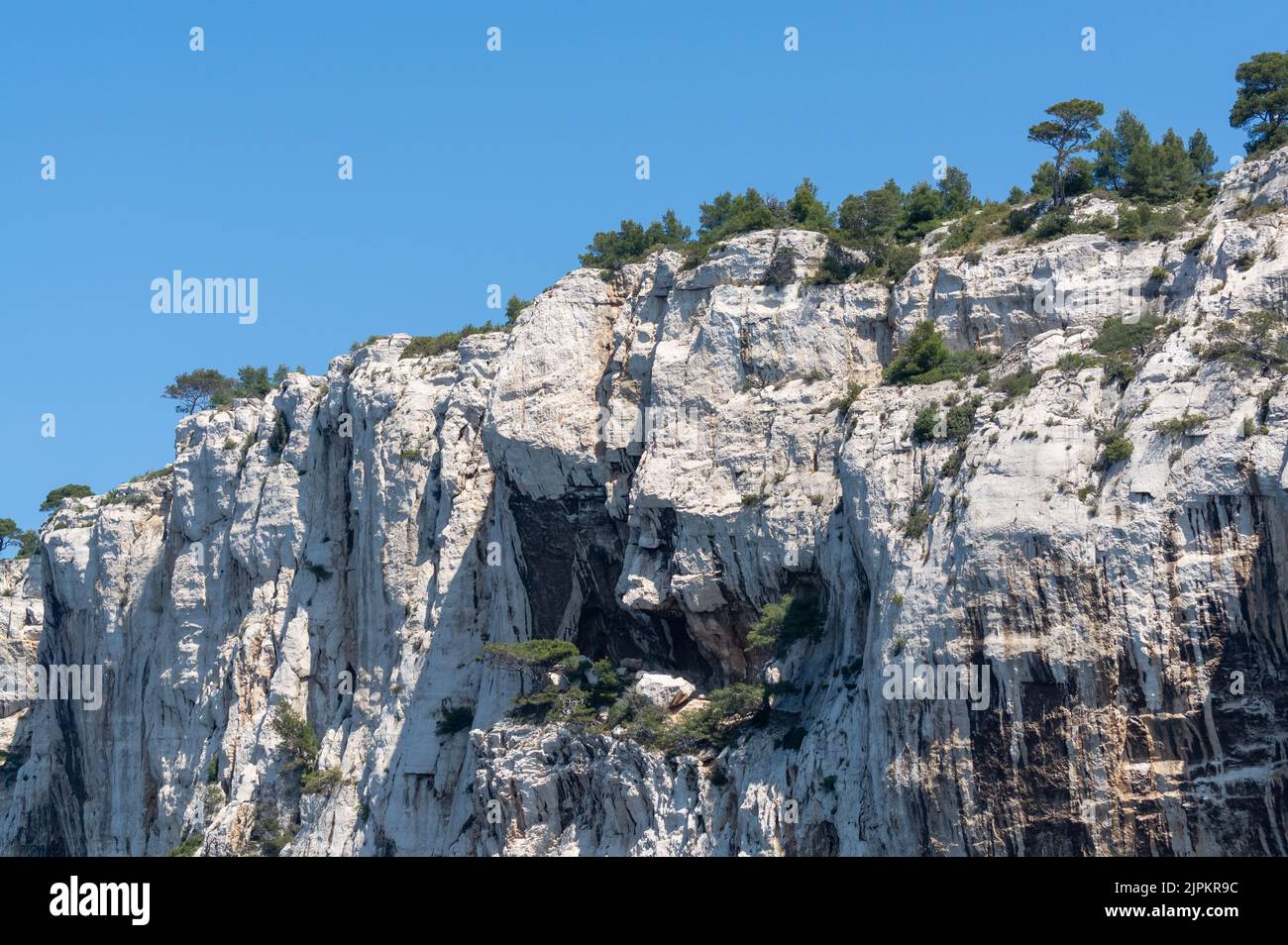 Limestone cliffs and blue sea near Cassis, boat excursion to Calanques ...