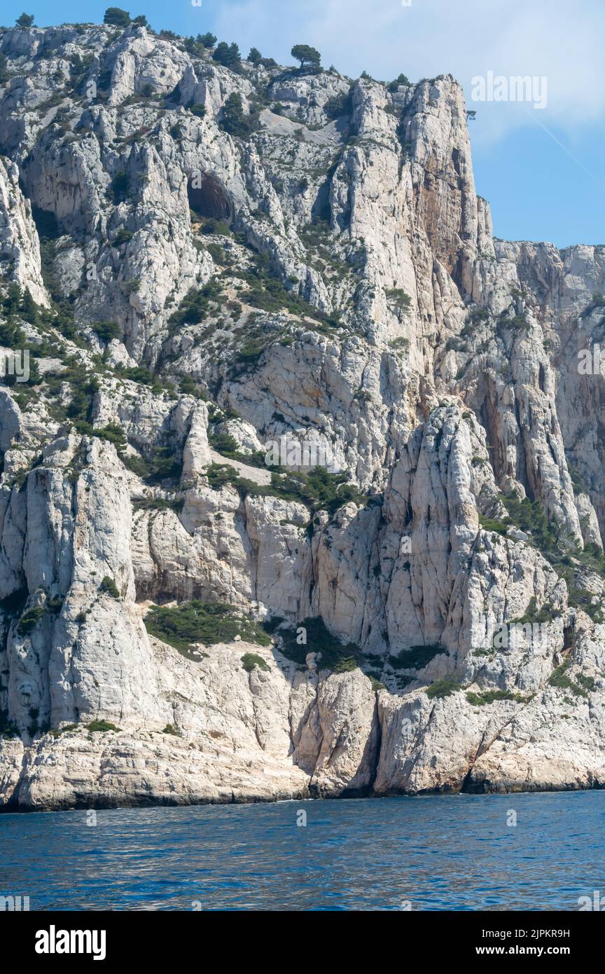Limestone cliffs and blue sea near Cassis, boat excursion to Calanques ...