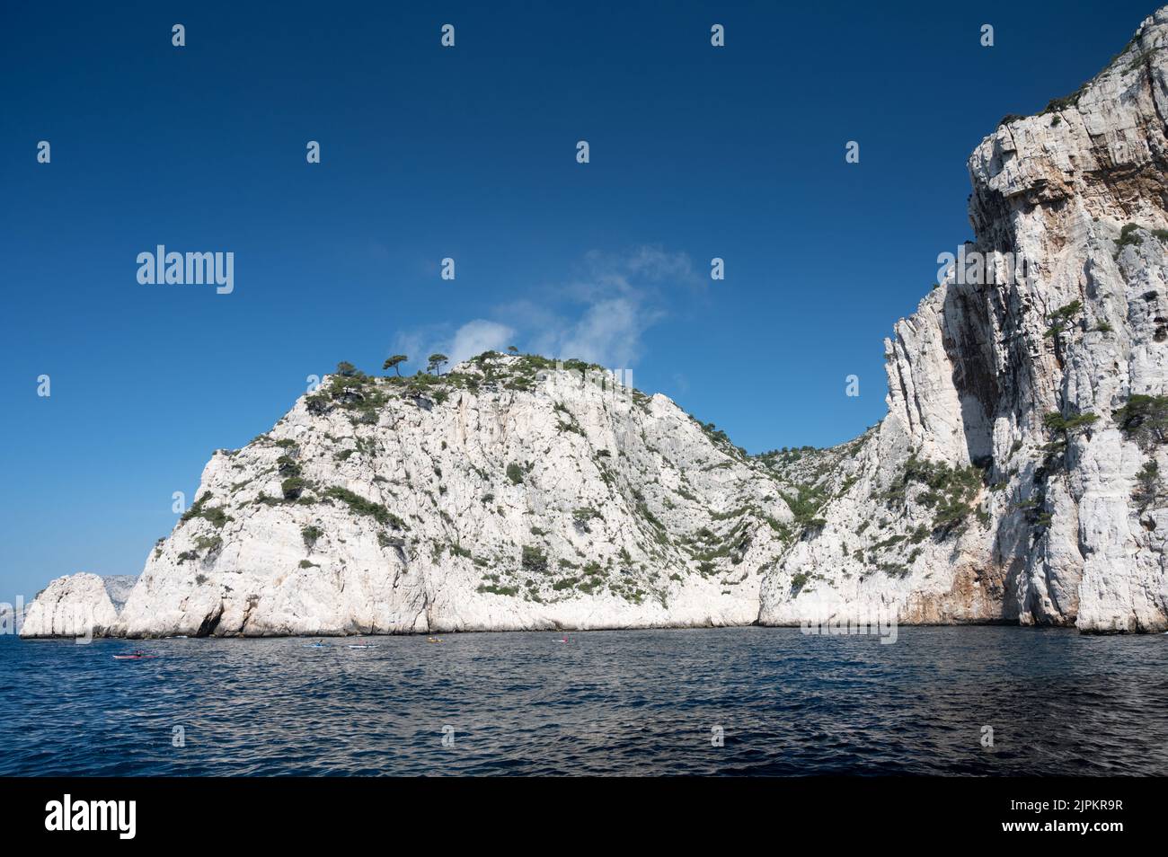 Limestone cliffs and blue sea near Cassis, boat excursion to Calanques ...