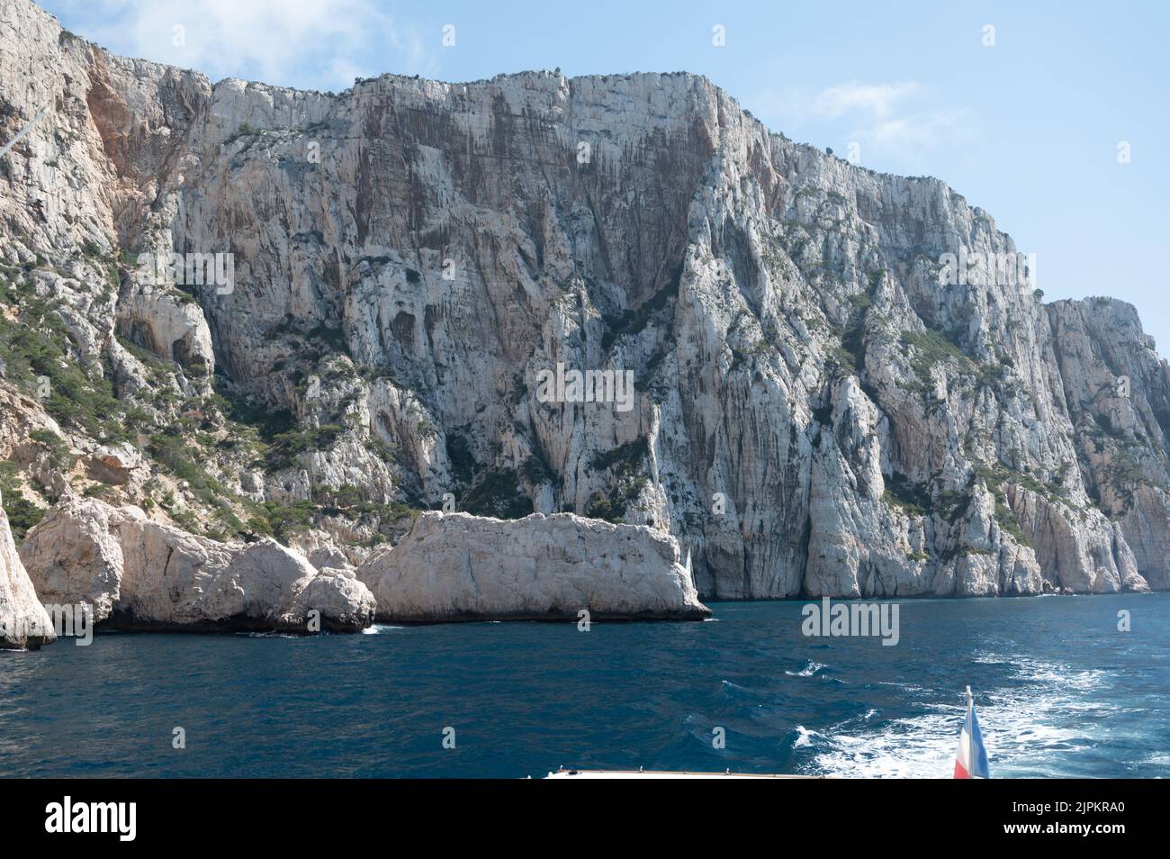 Limestone cliffs and blue sea near Cassis, boat excursion to Calanques ...