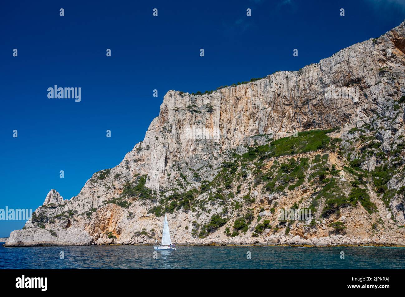Limestone cliffs and blue sea near Cassis, boat excursion to Calanques ...