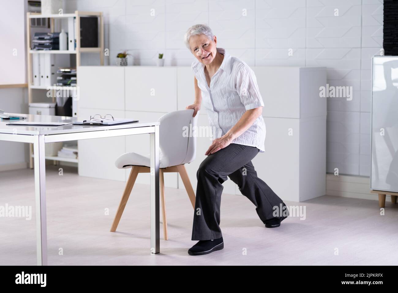 Woman standing one leg senior hi-res stock photography and images - Alamy